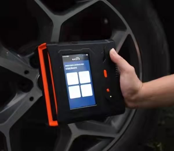 Hand-held tire tread depth scanner